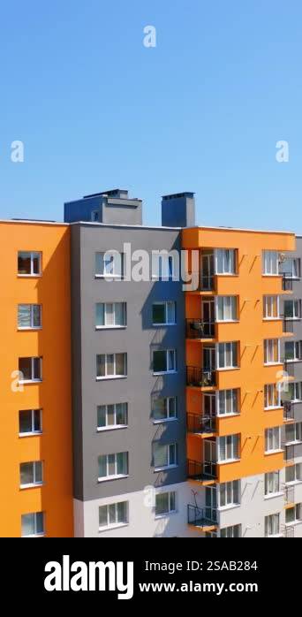 Bright multi-storey building in sunny day. Modern design of high-rise ...