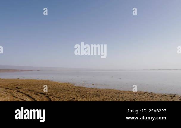 The rain-filled Lake of Iriki at Erg Chegaga, Sahara desert, Morocco ...