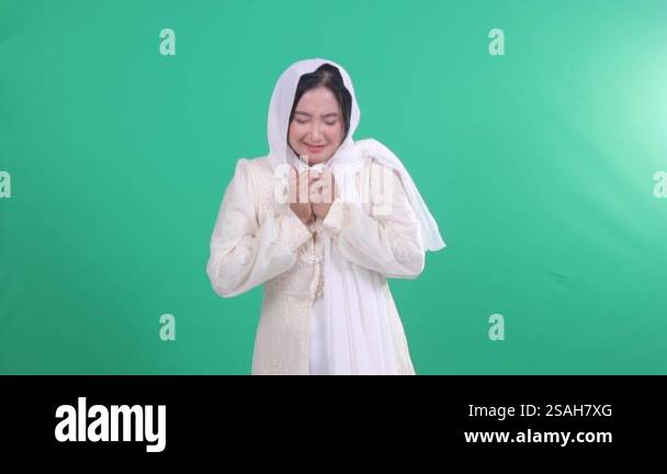 An asian woman expression crying miserably hands clenched together ...