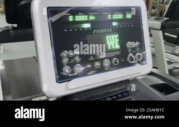 Close up of a treadmill control panel displaying "Welcome" message with ...