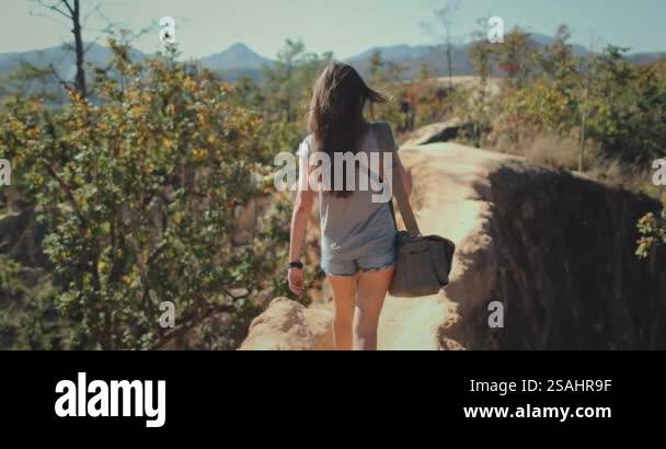 Woman tourist traveler walking Pai Canyon Kong Lan, Chiang Mai Province ...