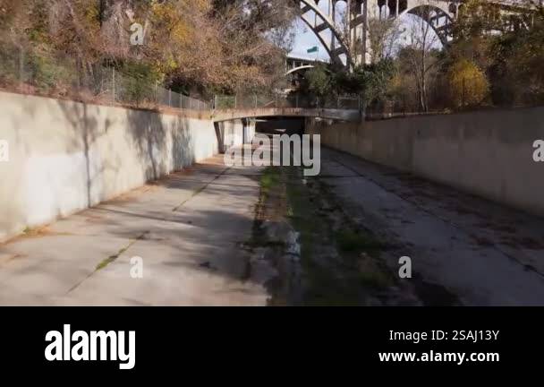 A unique view of a dry riverbed below the iconic Colorado Street Bridge ...