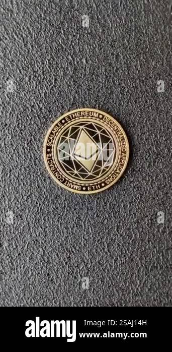 Ethereum cryptocurrency dummy in the form of a round iron coin ...