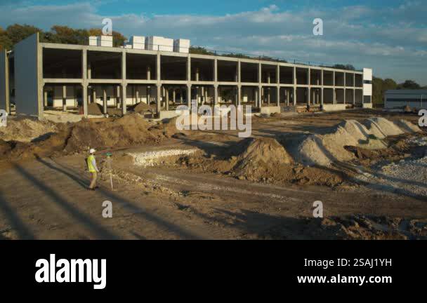 An evolving construction site is showcasing the framework of a modern ...
