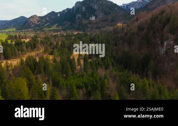Aerial view of mountains, nature and forest and two castles together ...