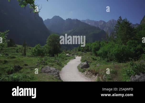 Germany, Salet, Schoenau am Koenigsee. Tourists follow hiking trail ...