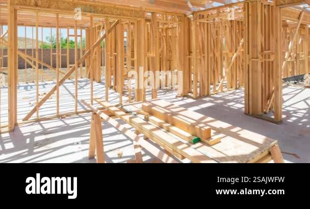 Before and After Slider Revealing Completed Custom Kitchen Under Wood Construction Framing Stock ...