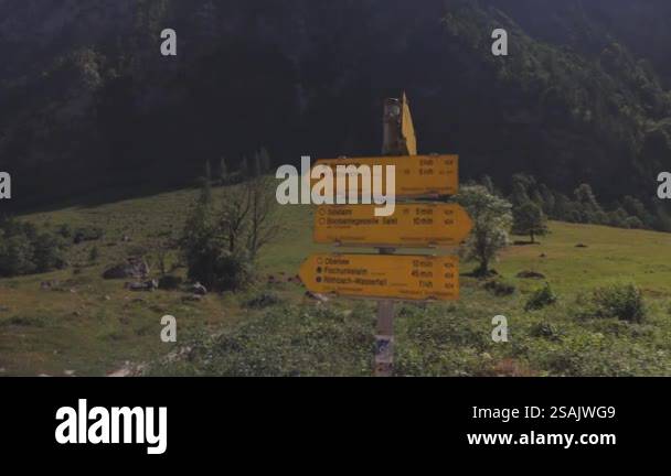 June 15, 2023. Germany, Salet, Schoenau am Koenigsee. Tourists follow ...