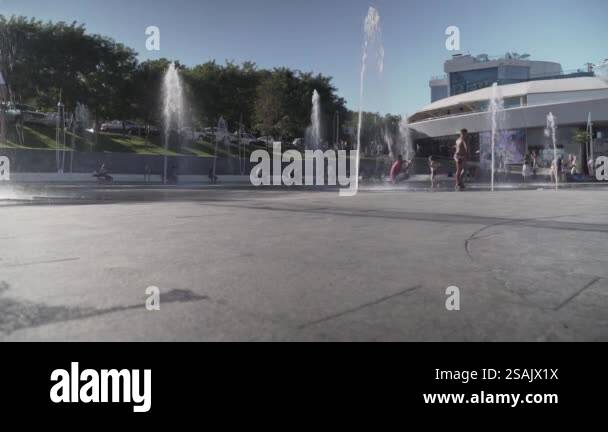 Ukraine, Odessa, August 25, 2021. Happy children playing and bathing in ...