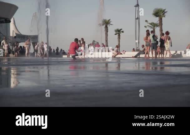Ukraine, Odessa, August 25, 2021. Happy children playing and bathing in ...