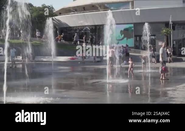 Ukraine, Odessa, August 25, 2021. Happy children playing and bathing in ...