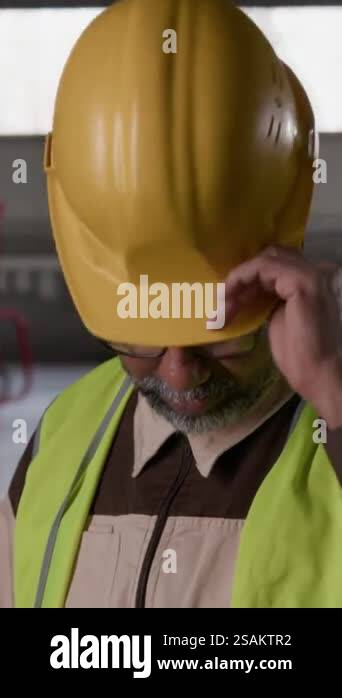 Vertical closeup portrait of confident middle-aged Indian male ...