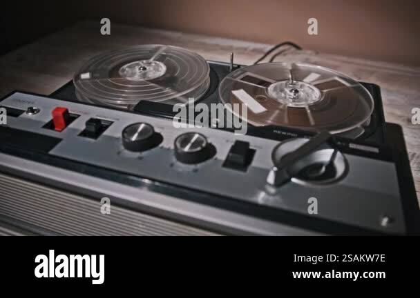 High-angle perspective of a vintage reel-to-reel tape recorder in ...