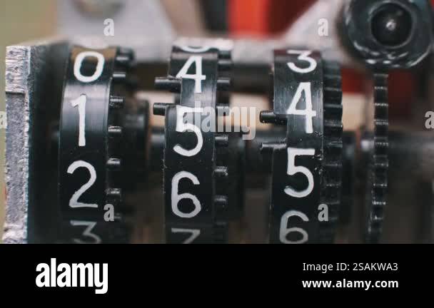 A detailed macro shot of a mechanical counter, highlighting the smooth ...