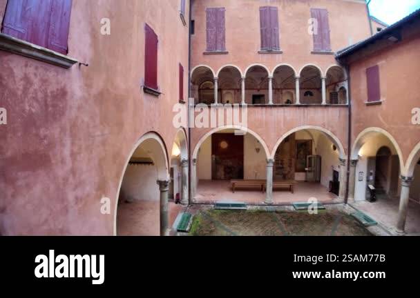 The captivating courtyard of Dozza Castle in Italy showcases a unique ...