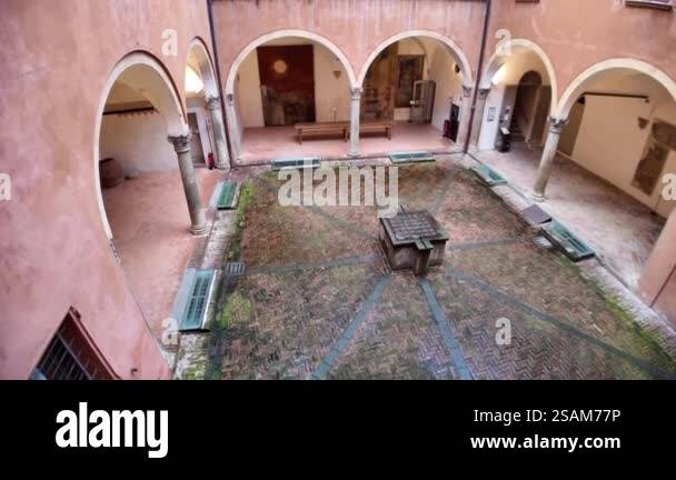 The captivating courtyard of Dozza Castle in Italy showcases a unique ...