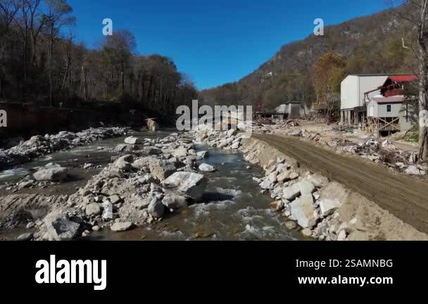 Damage to homes from Hurricane Helen. A mountain river washed out by ...