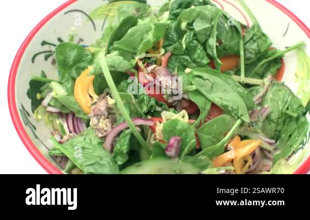 Salad of fresh greens, tuna, tomatoes and eggs. Diet salad of healthy ...