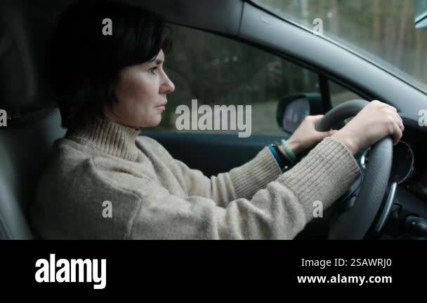Serene Woman Driving Her Car Through The Countryside, Female Driver ...