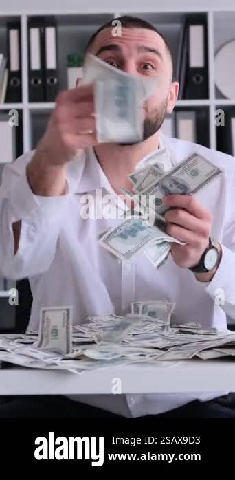 Positive male young adult Caucasian office worker celebrating victory ...