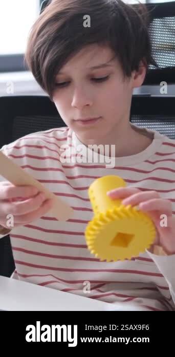 Caucasian boy, doing homework, measuring with ruler 3D printed detail ...
