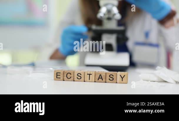 A skilled lab technician meticulously analyzes ecstasy through the use ...