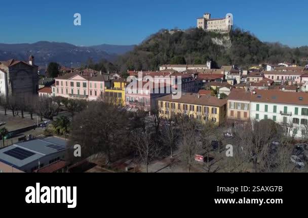 Beautiful drone view of the fortress and town of Angera, Italy. Red ...