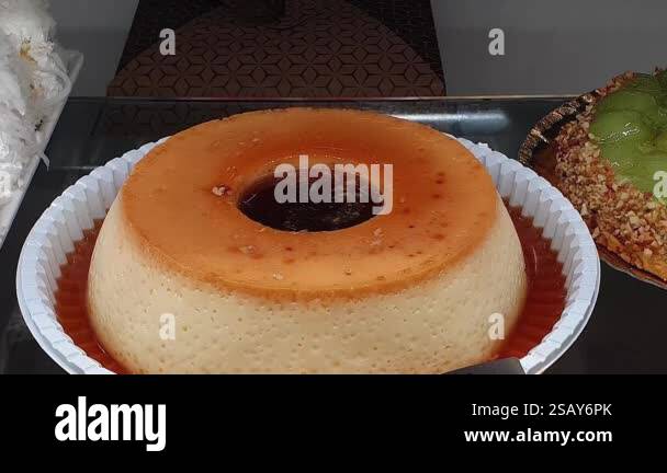 Condensed milk pudding smooth Stock Videos & Footage - HD and 4K Video ...