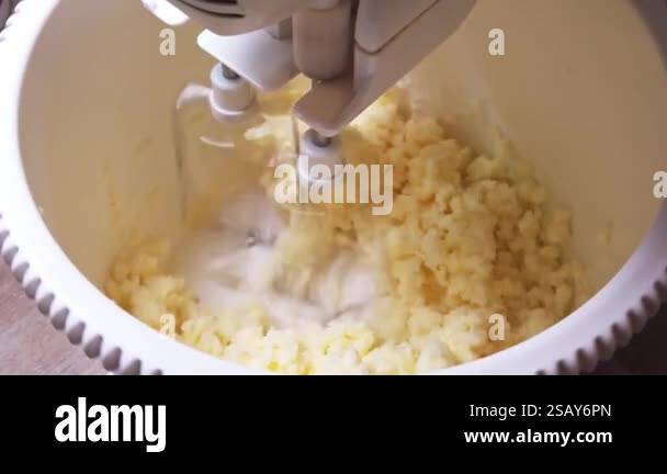Watch as creamy butter transforms into a silky mixture when whipped ...