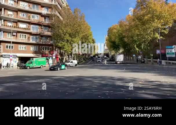 Street view showing city centre buildings in Madrid, Spain. Spanish ...