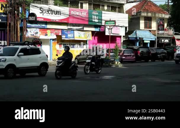 Indonesian intersection without traffic lights, reflecting indiscipline ...