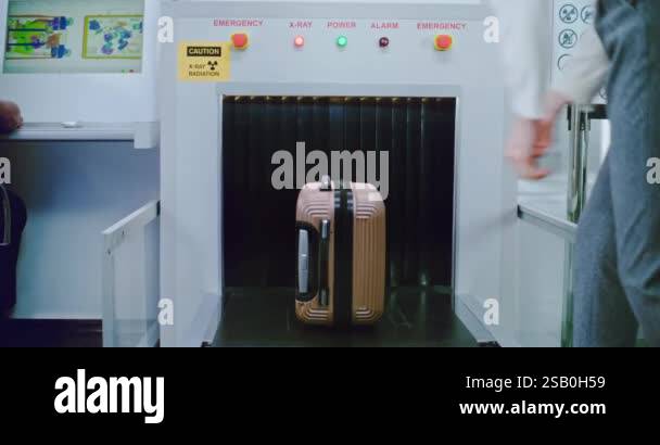 Airport Security Checkpoint: Passenger Places Suitcase on Conveyor Belt ...