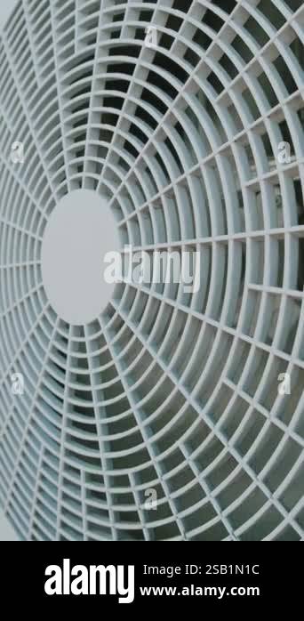 A detailed view of a ventilation fan grille, highlighting its intricate ...