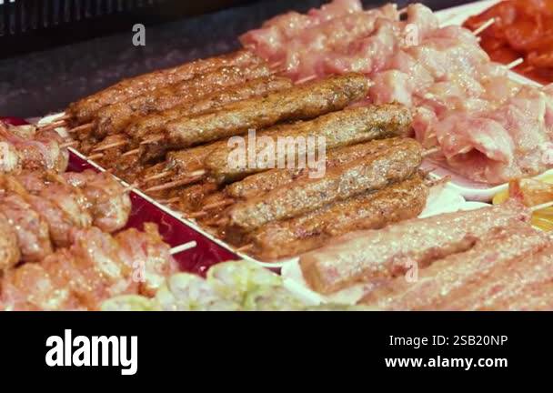 Semi-prepared meat products. Meat preparations in sauce for cooking on ...