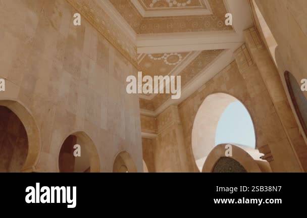 Beige walls and ornate ceiling inside Hassan II Mosque in Casablanca ...