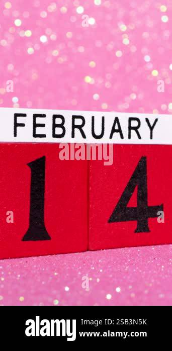 Portrait vertical footage of a calendar block showing the date February ...