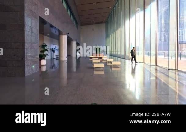 Shanghai, China - December 8, 2024 Lobby near the gigantic windows at ...