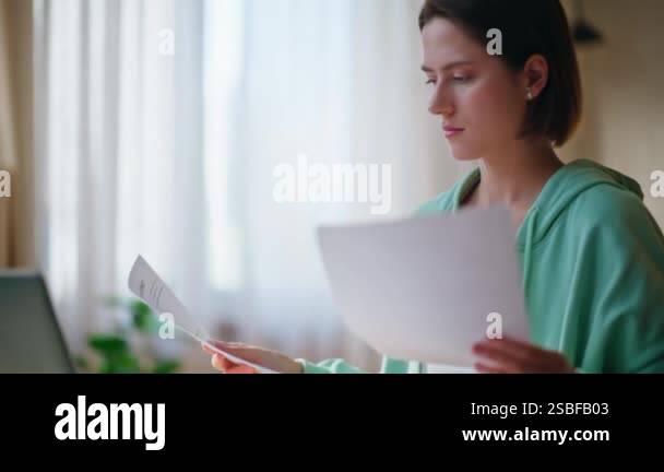 Stressed accountant worried work mistake reading business documents at ...