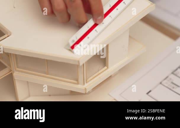 Slow motion home designer using architectural equipment review and ...