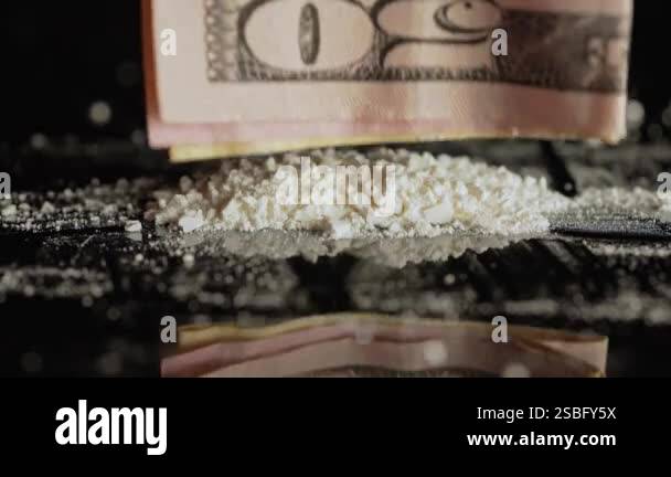 Person preparing illegal street drugs like white crystalline powder for ...