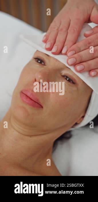 Aesthetic preparation: Washing a woman face before cream and anesthesia ...