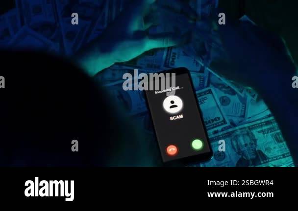 A woman collects dollar bills scattered on a table while a scam call ...