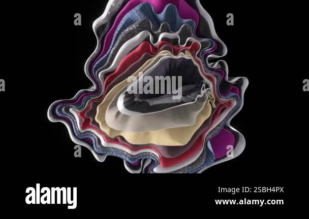 Multiple layers of colorful fabrics are waving and creating concentric ...