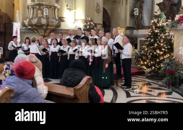 LVIV, UKRAINE - JANUARY 11, 2025: A choir of adult men and women ...