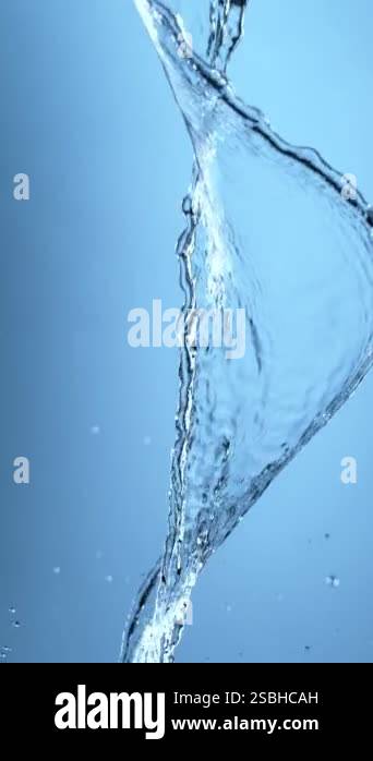 Super slow motion of splashing water isolated on white background ...