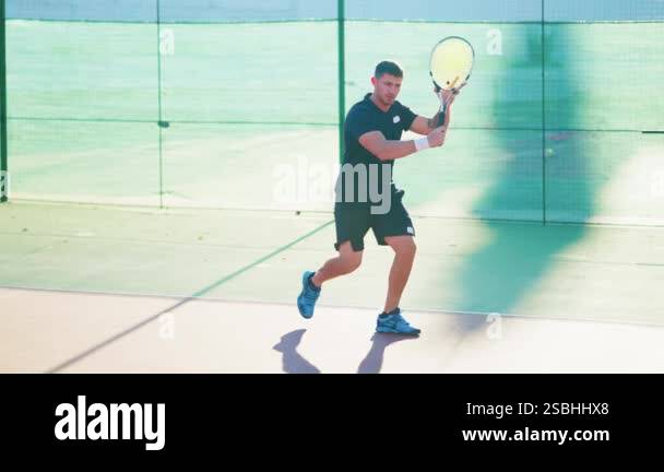 Man holds racket trains body movements. Sportsman training trajectory ...
