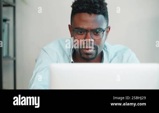 focused IT professional man with laptop, portrait of office worker or ...