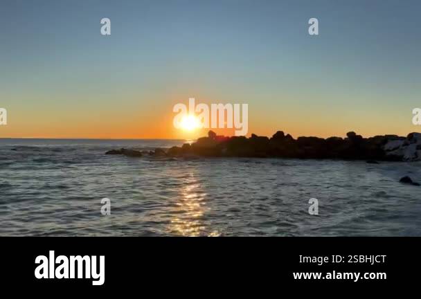 Sunset horizon over sea near water. View of beautiful evening sunset in ...