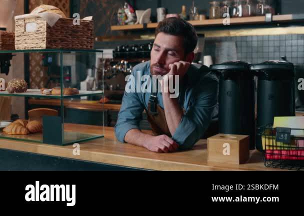 Tired bored Caucasian male entrepreneur cafeteria worker man feel ...