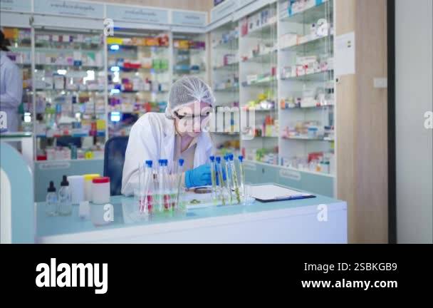 Chemical scientist doing antibiotic trials and testing in the ...